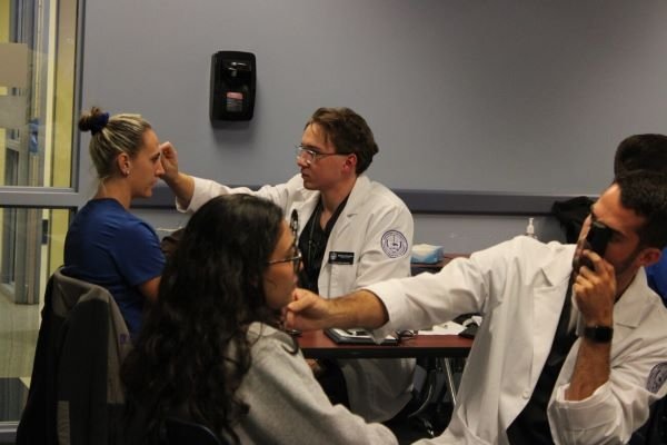 Optometry Students Perform Vision Screening on Incoming Dental Students ...